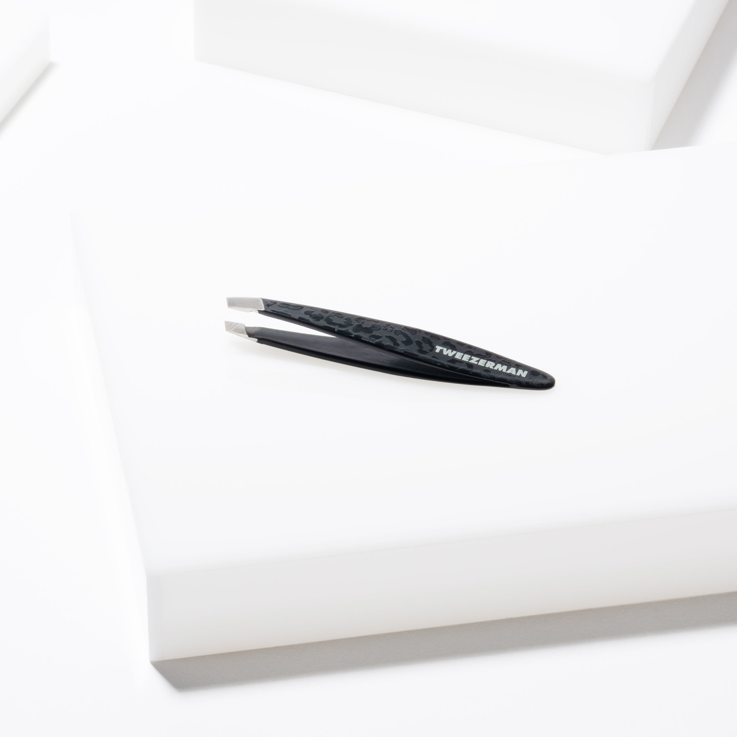 Tweezerman Mini Slant Tweezer Black Leopard | False Eyelashes